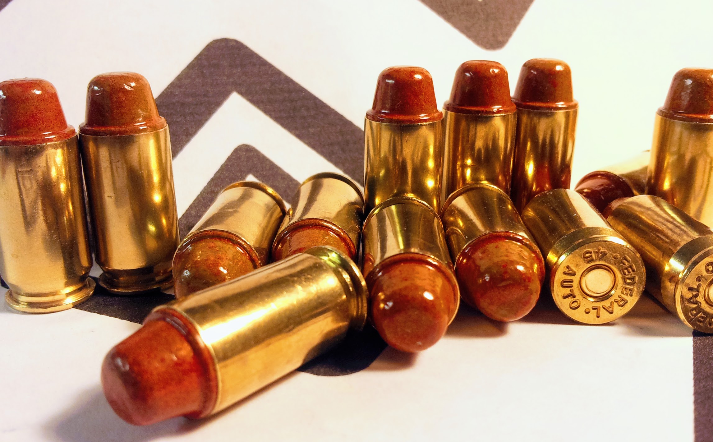 Pistol Powder Attacking Powder Coated Bullets?